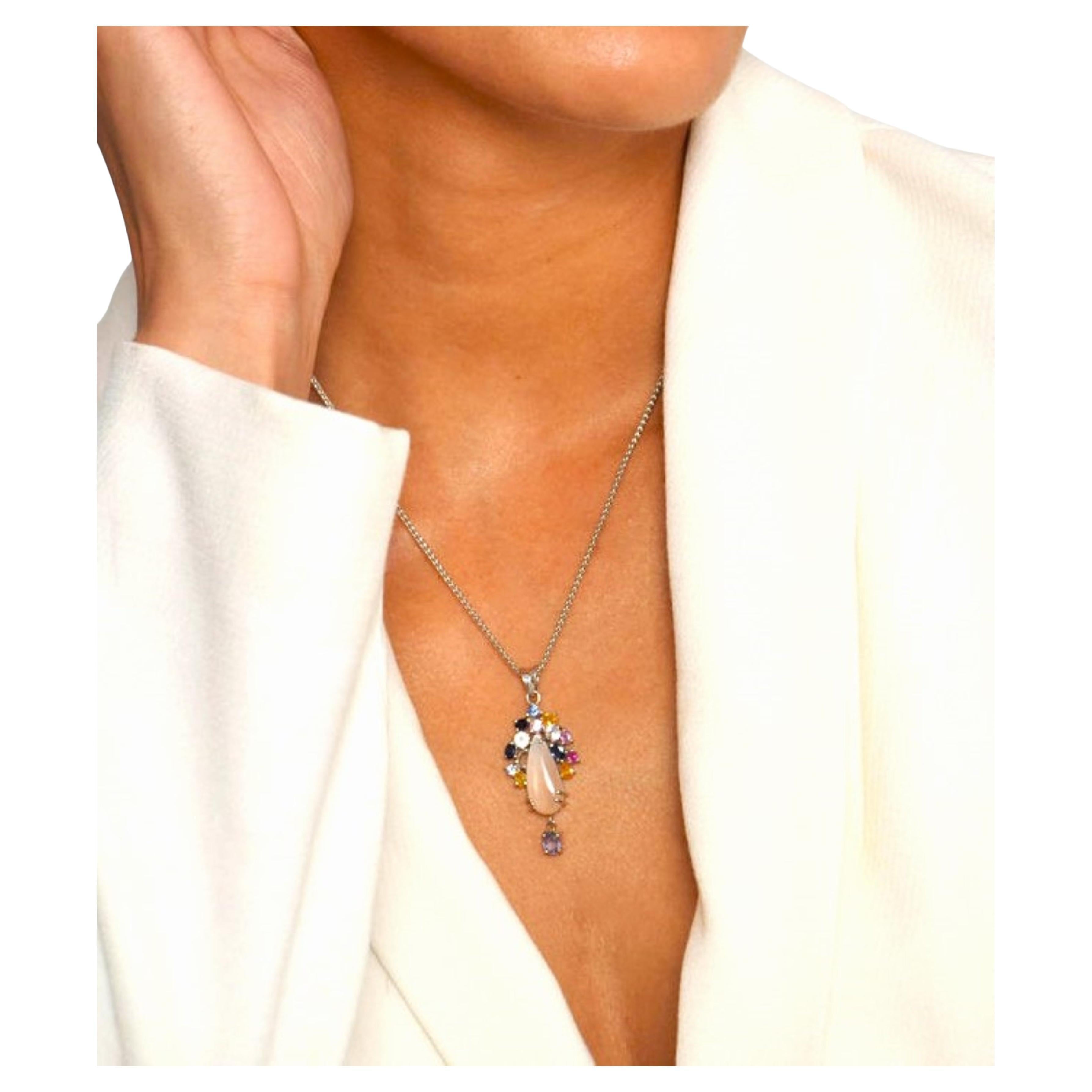 Platinum Silver Pendant with Sapphire and Tanzanite surrounding a 3ct ...