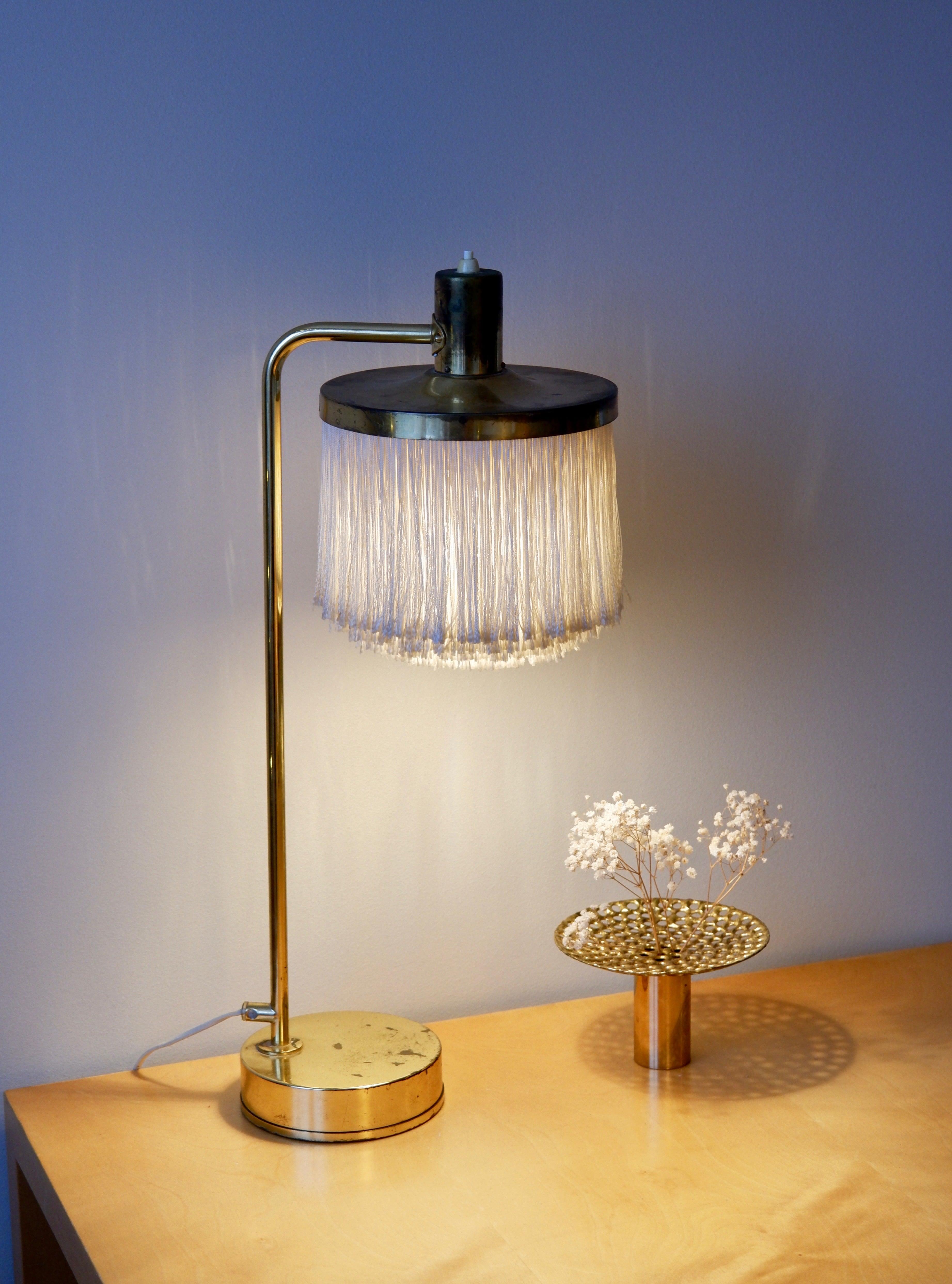 Hans Agne Jakobsson fringe table lamp model B140, Silk and brass circa ...
