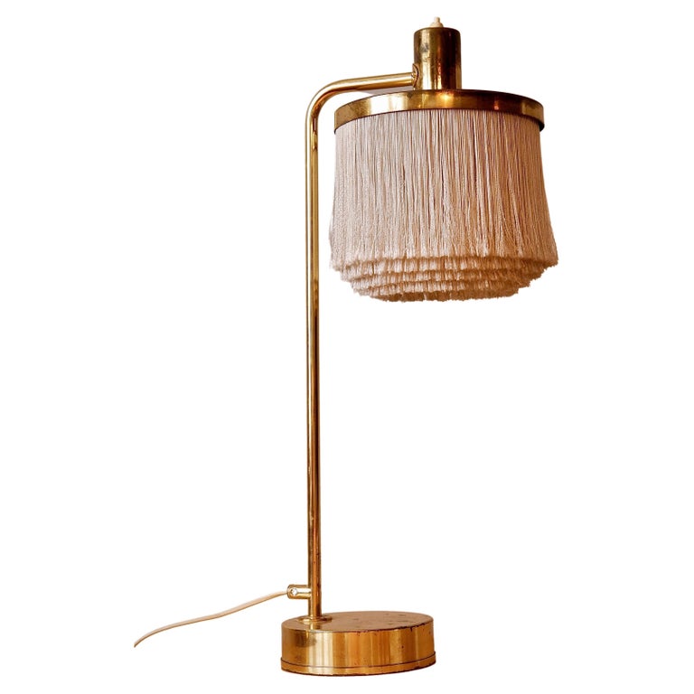 Hans Agne Jakobsson fringe table lamp model B140, Silk and brass circa ...