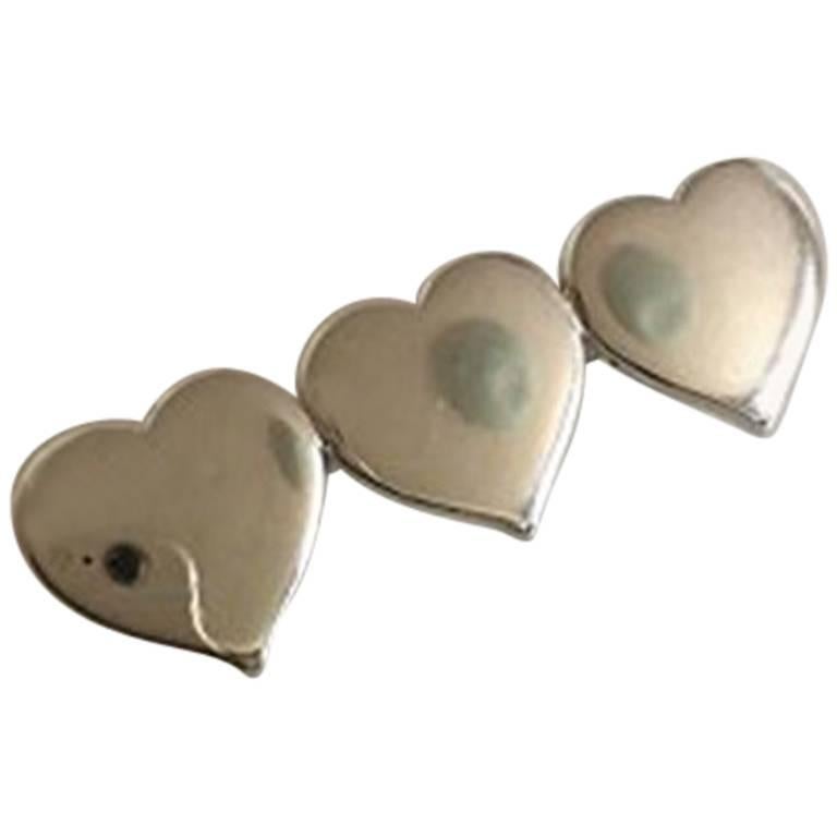 Hans Hansen Sterling Silver Brooch with Three Hearts at 1stDibs