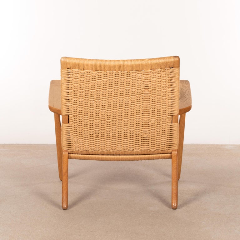 Hans J. Wegner CH25 Lounge Chair in Oak and Naturel Cord for Carl Hansen and Søn at 1stDibs