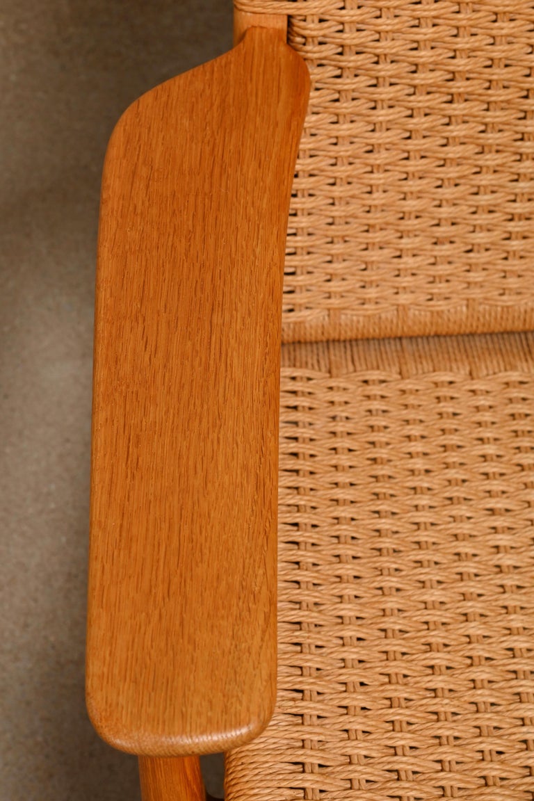 Hans J. Wegner CH25 Lounge Chair in oak and paper-cord for Carl Hansen and Son at 1stDibs