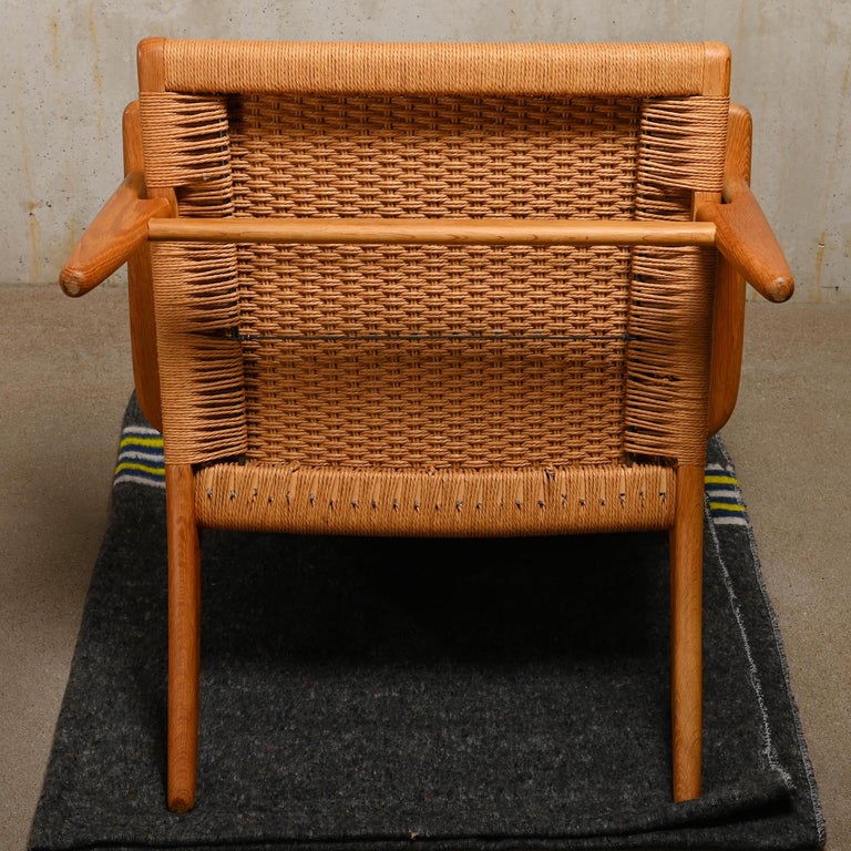 Hans J. Wegner CH25 Lounge Chair in oak and paper-cord for Carl Hansen and Son at 1stDibs