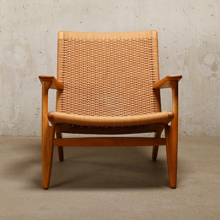 Hans J. Wegner CH25 Lounge Chair in oak and paper-cord for Carl Hansen and Son at 1stDibs