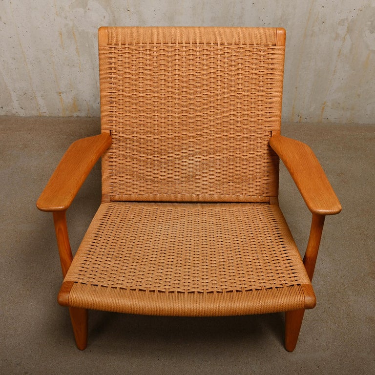 Hans J. Wegner CH25 Lounge Chair in oak and paper-cord for Carl Hansen and Son at 1stDibs
