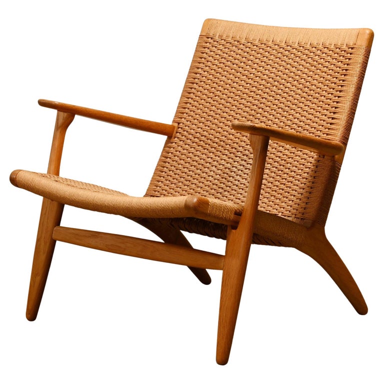 Hans J. Wegner CH25 Lounge Chair in oak and paper-cord for Carl Hansen and Son at 1stDibs