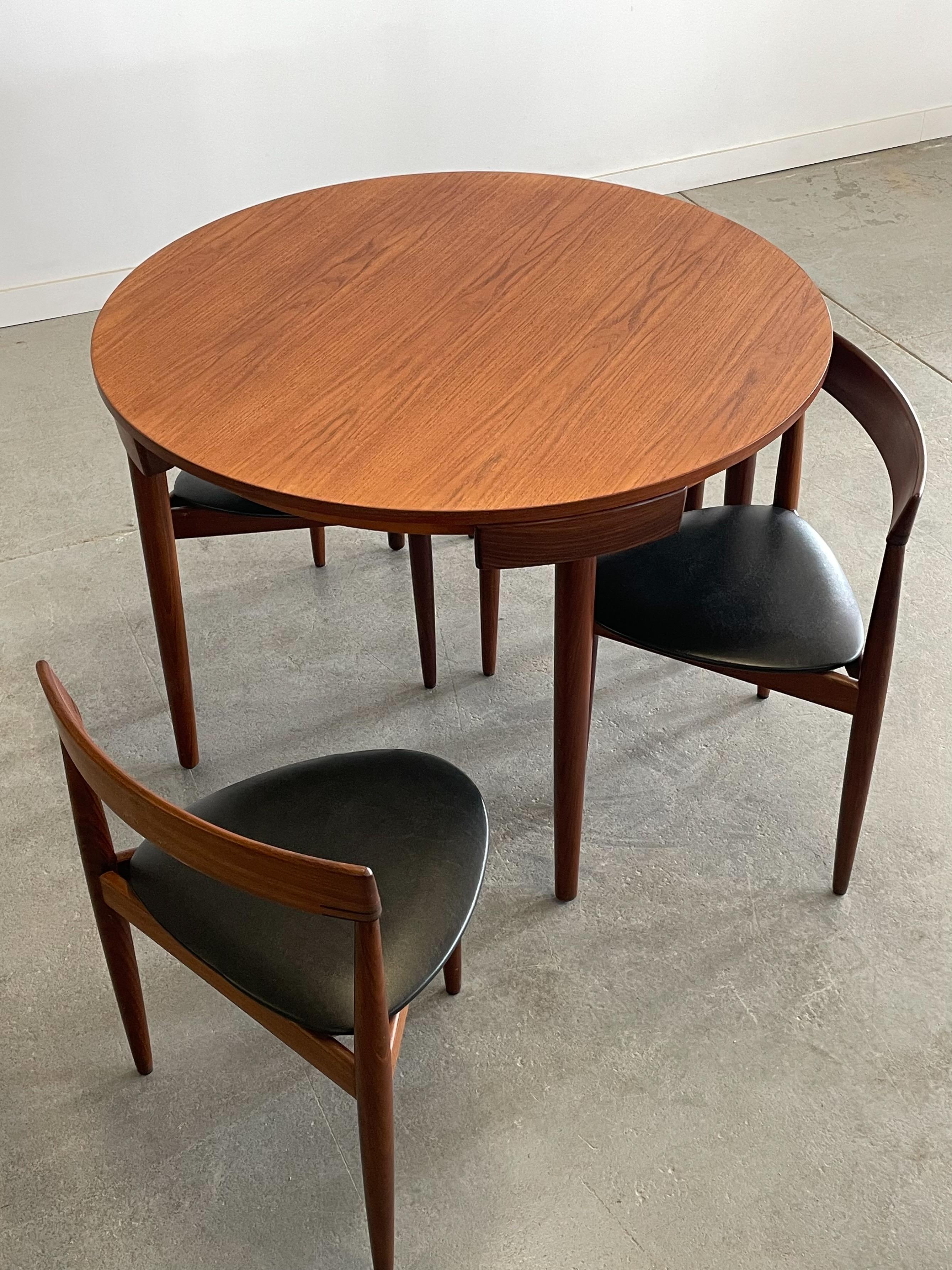 Hans Olsen Teak 'Roundette' Dining Table and Chairs For Sale at 1stDibs