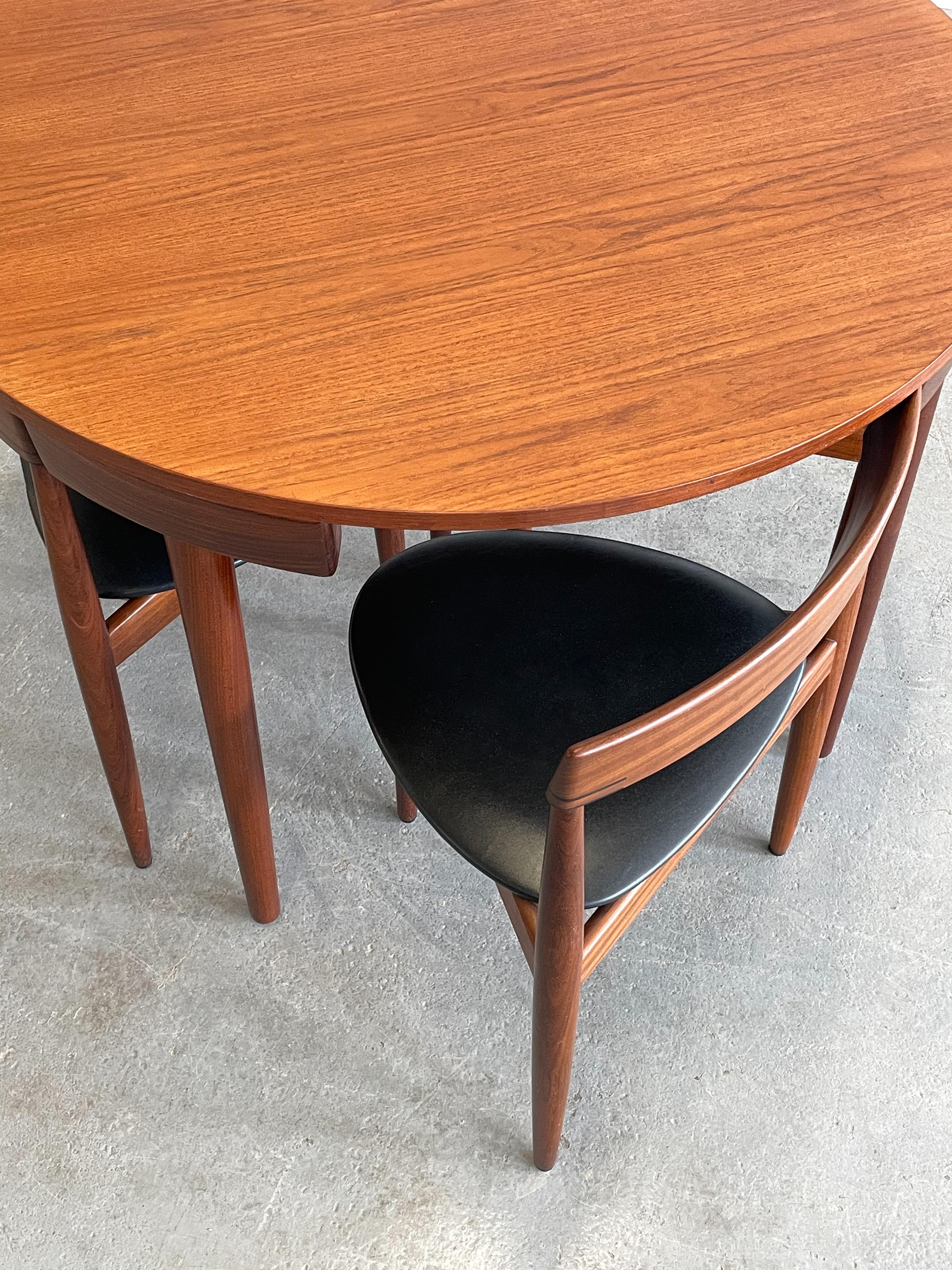 Hans Olsen Teak 'Roundette' Dining Table and Chairs For Sale at 1stDibs