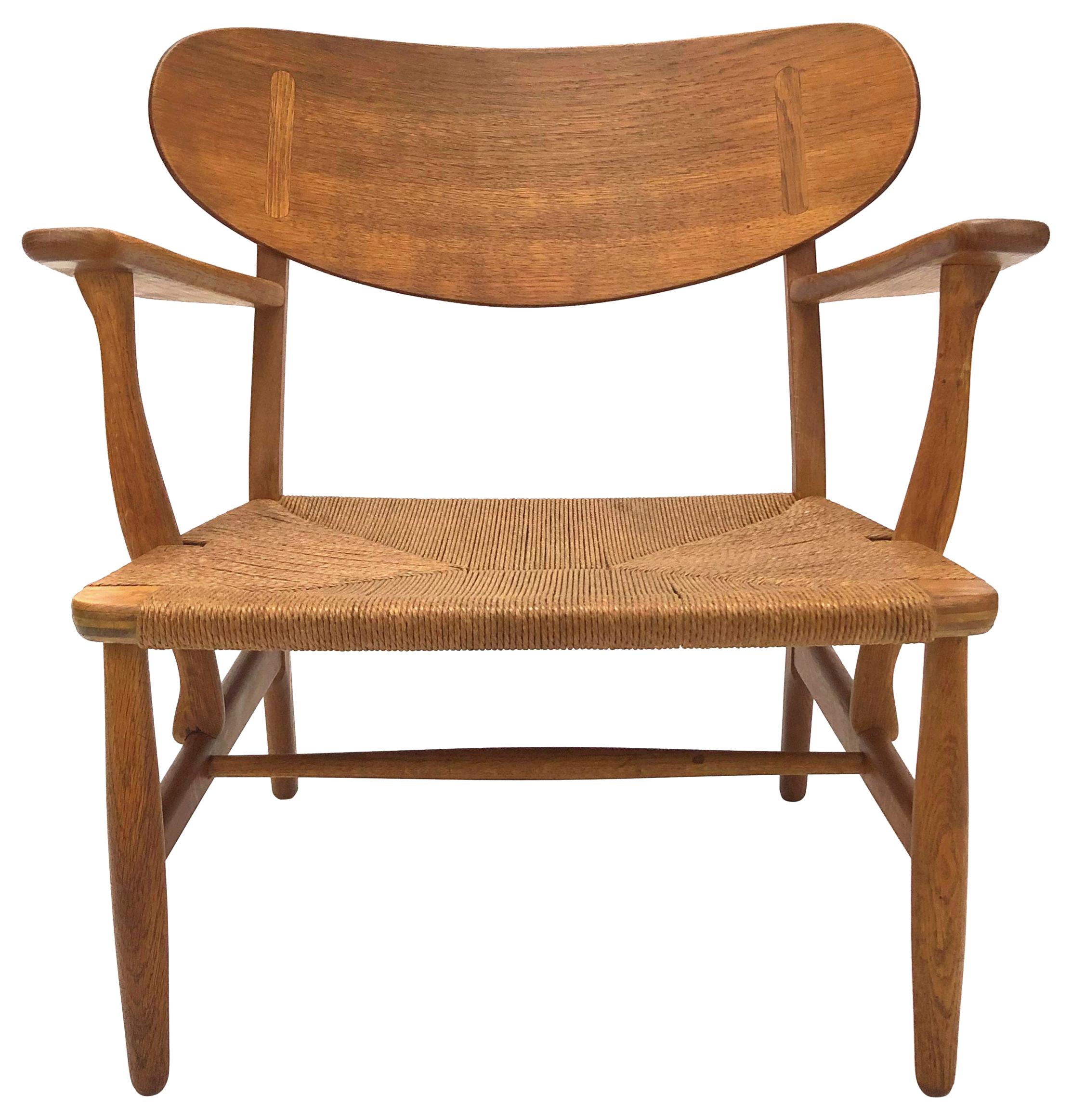 Hans Wegner CH22 Lounge Chair in Teak and Oak at 1stDibs