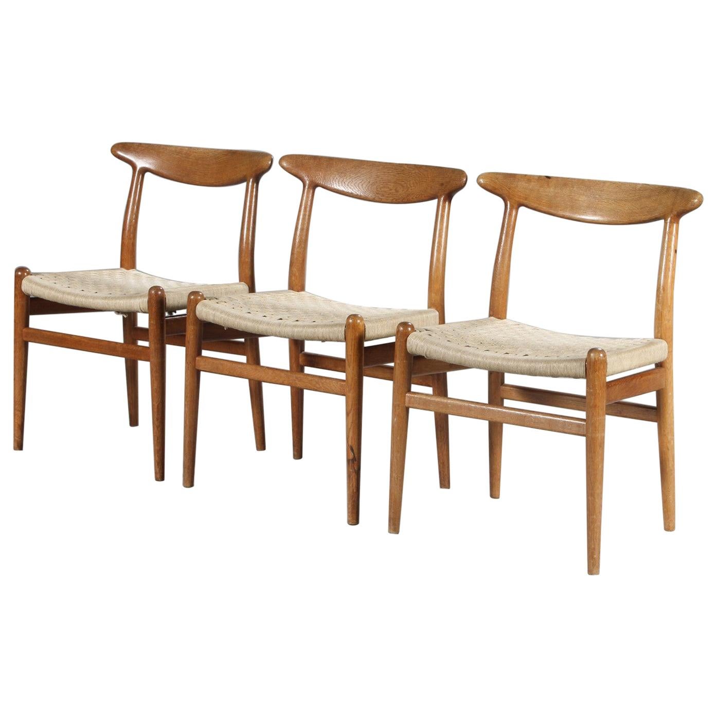 George Nakashima Grass Seat and Walnut Chairs at 1stDibs