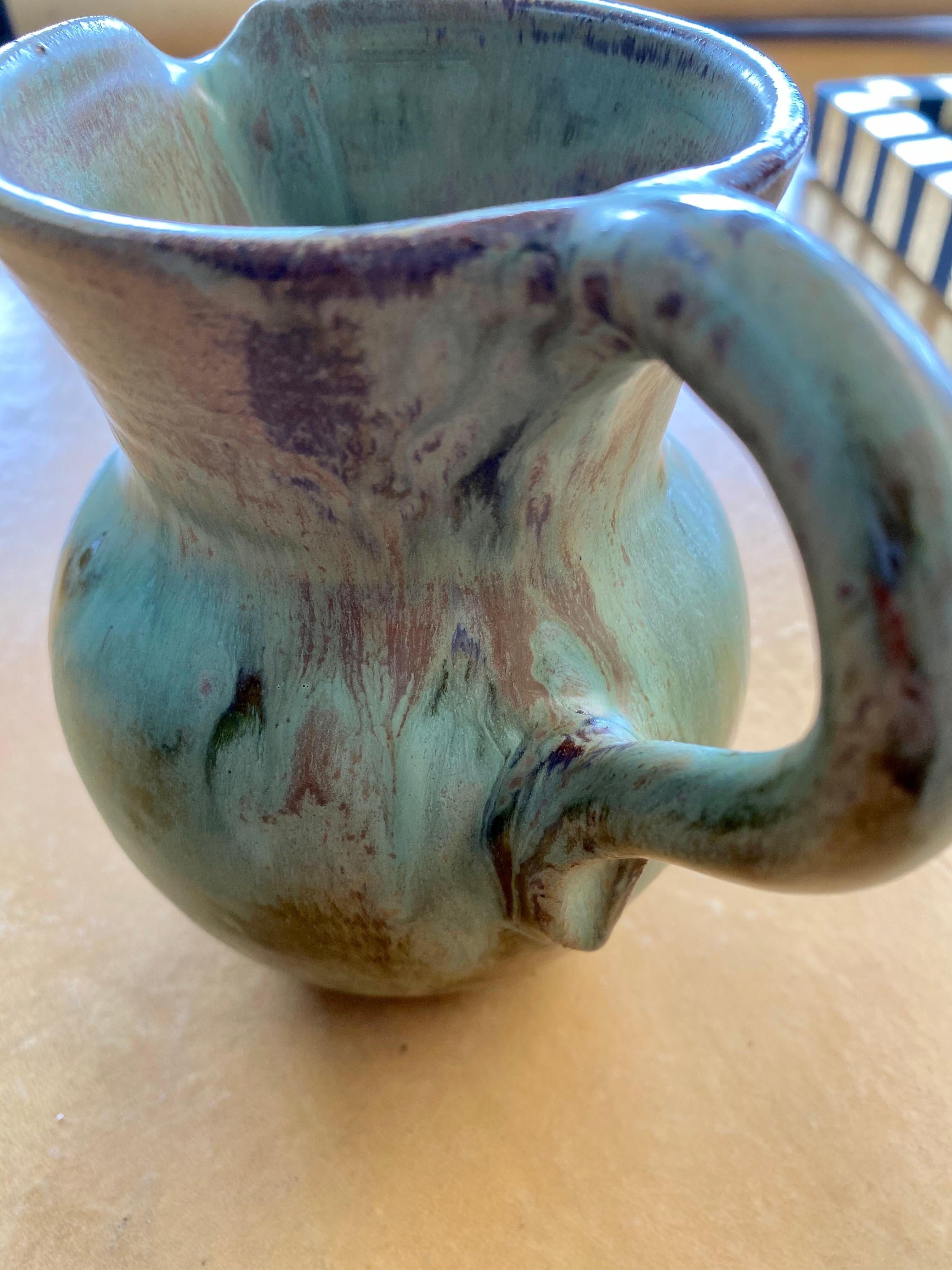 Harding Black Ceramic Pitcher 1973 at 1stDibs