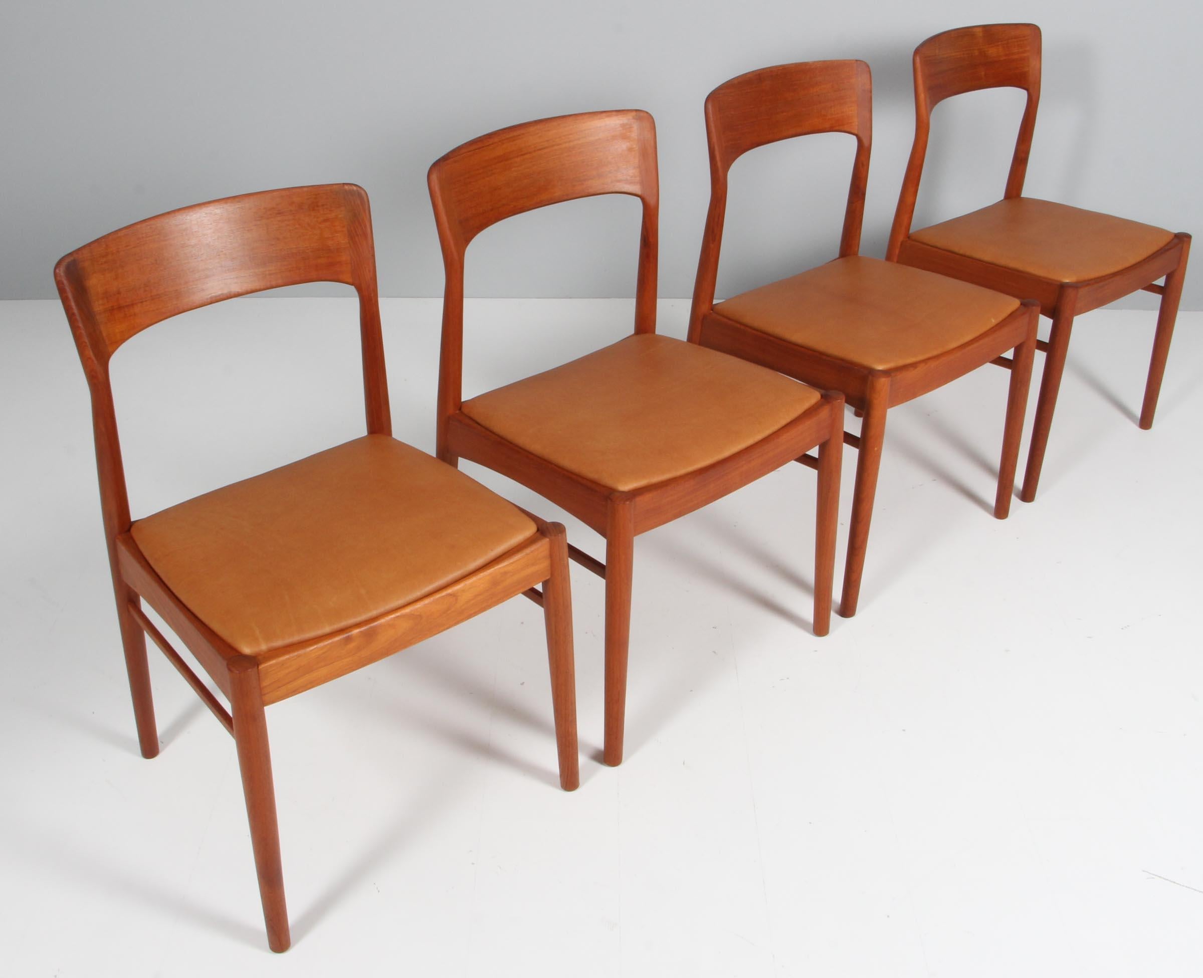 Henning Kjærnulf Four Teak Dining Chairs at 1stDibs