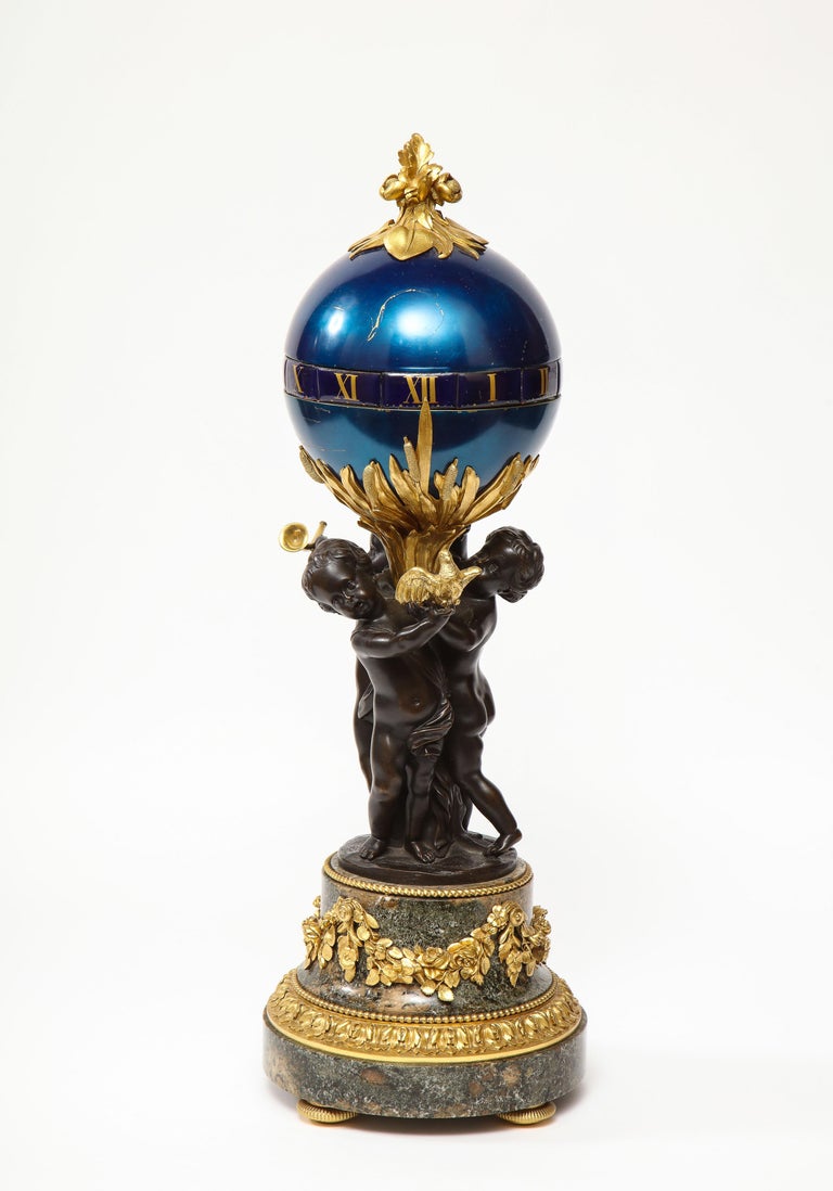 Henry Dasson, a French Gilt and Patinated Bronze Marble and Enamel ...