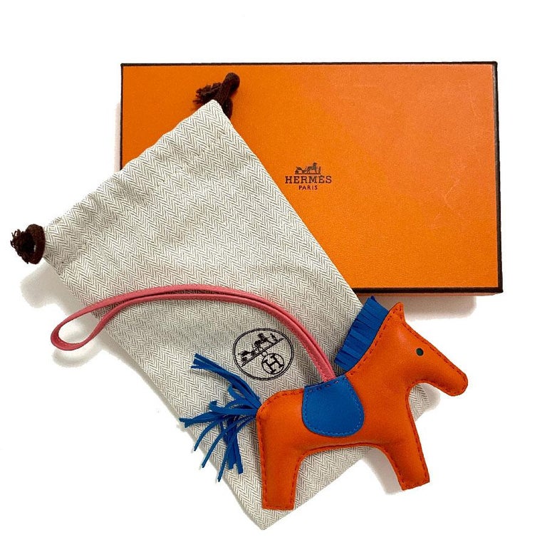 HERMES Charm Orange Leather Rodeo at 1stDibs