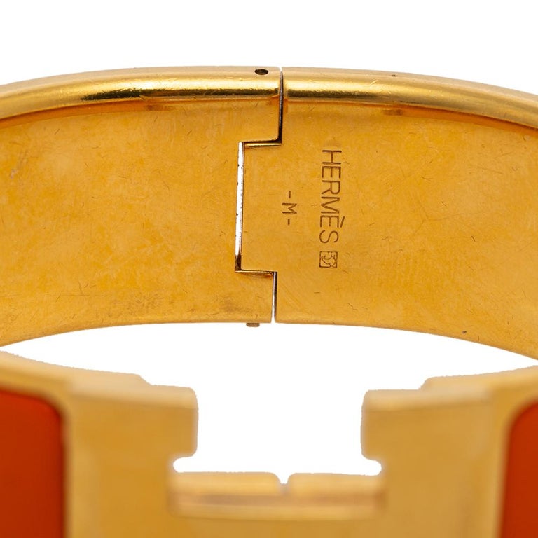 Hermès Clic Clac H Orange Enamel Gold Plated Wide Bracelet at 1stDibs