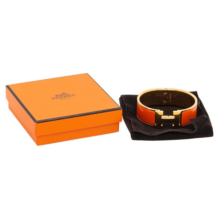 Hermès Clic Clac H Orange Enamel Gold Plated Wide Bracelet at 1stDibs