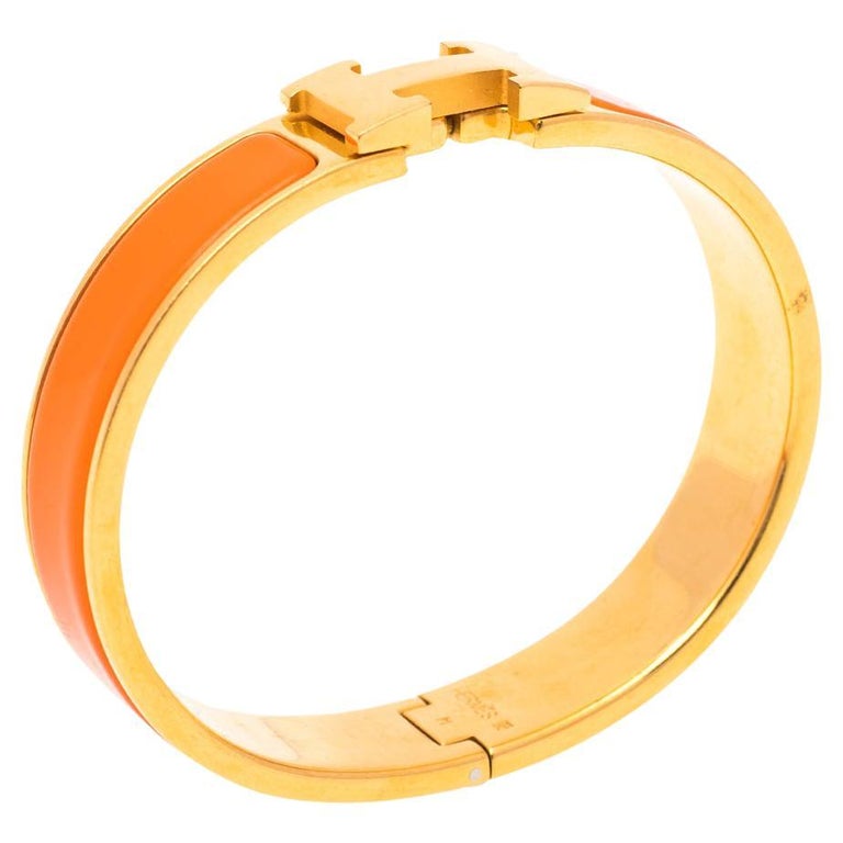 Hermès Clic H Orange Enamel Gold Plated Narrow Bracelet PM at 1stDibs