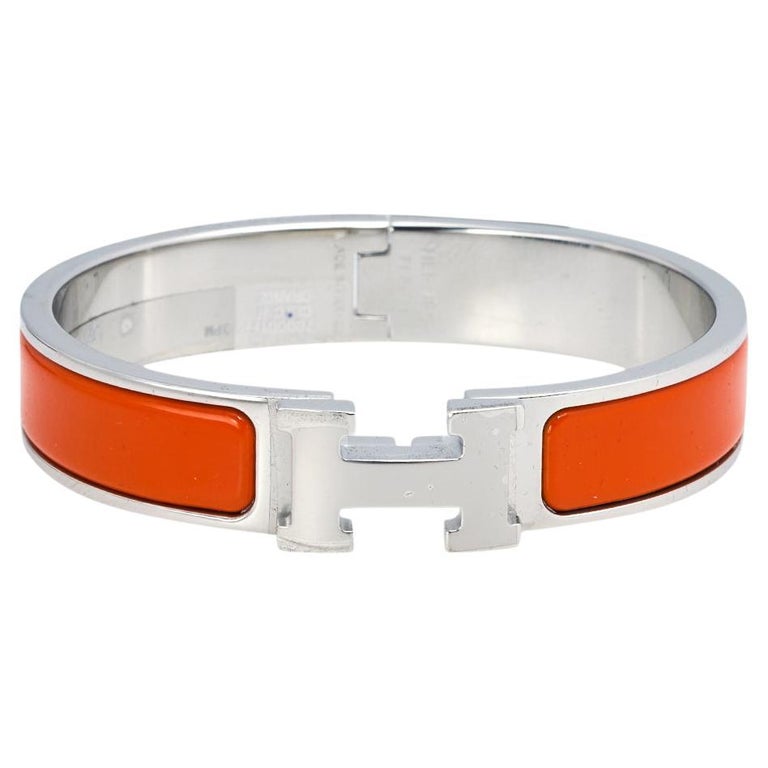 Hermès Clic H Orange Enamel Palladium Plated Narrow Bracelet at 1stDibs