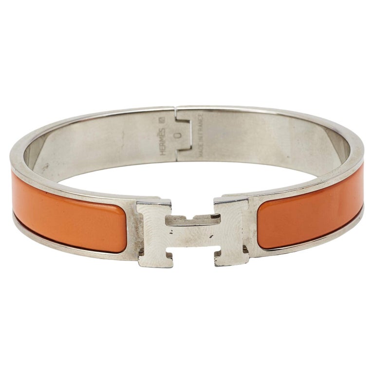 Hermes Clic H Orange Enamel Palladium Plated Narrow Bracelet For Sale at 1stDibs