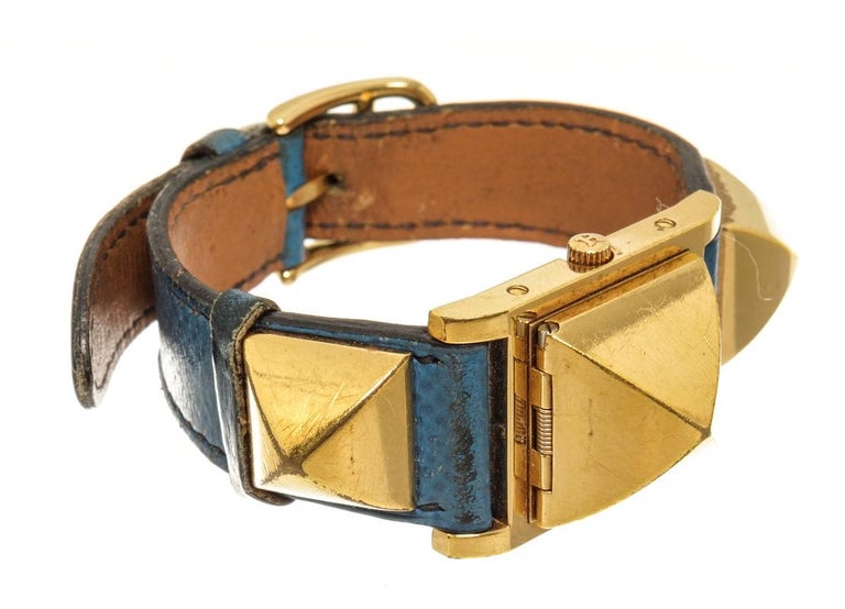 Hermes Gold Plated Metal and Leather Medor Quartz 18mm Watch at 1stDibs