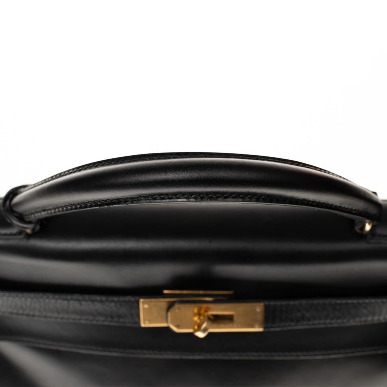 Hermès Kelly 32 cm strap shoulder bag in black calfskin box and gold ...