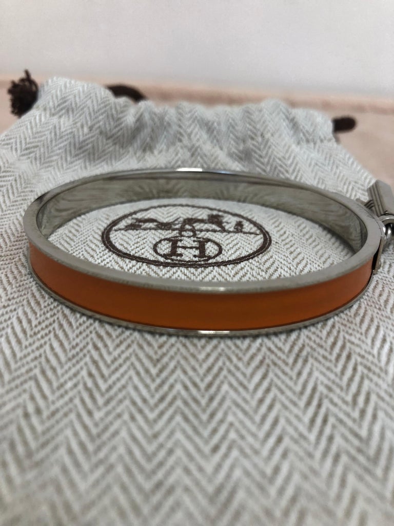Hermes Kelly H Lock Bangle in Palladium and Leather w/Pouch at 1stDibs