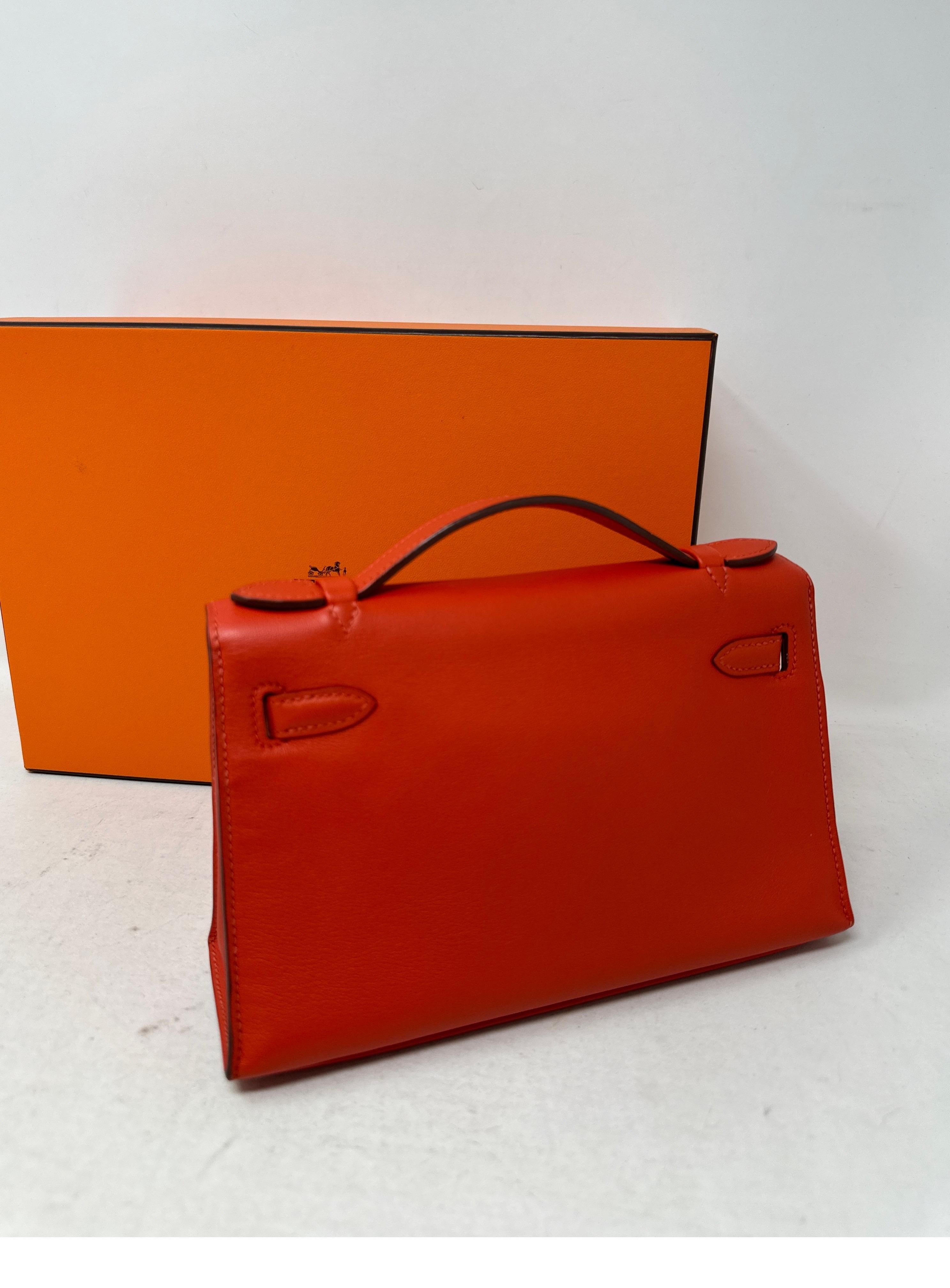 Hermes Kelly Orange Pochette For Sale at 1stDibs