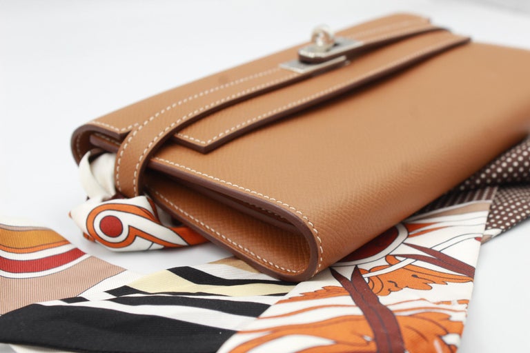 Hermès Kelly wallet in brown leather and its twilly at 1stDibs