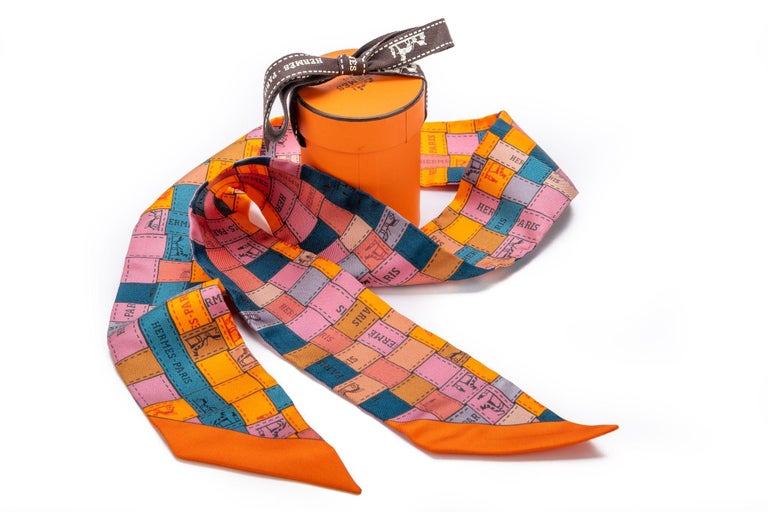 Hermès NIB Orange Checkers Twilly For Sale at 1stDibs