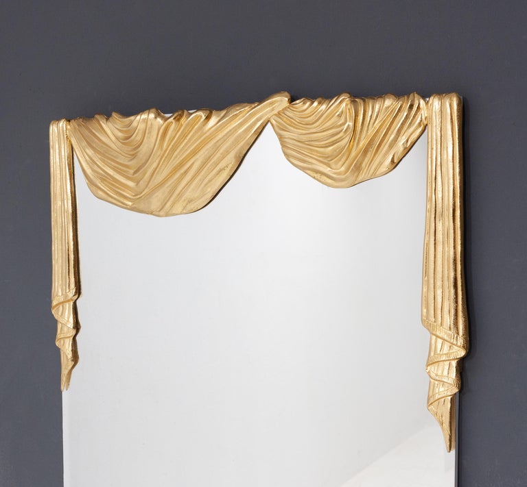 Hollywood Regency Bronze Drapery Wall Mirror at 1stDibs