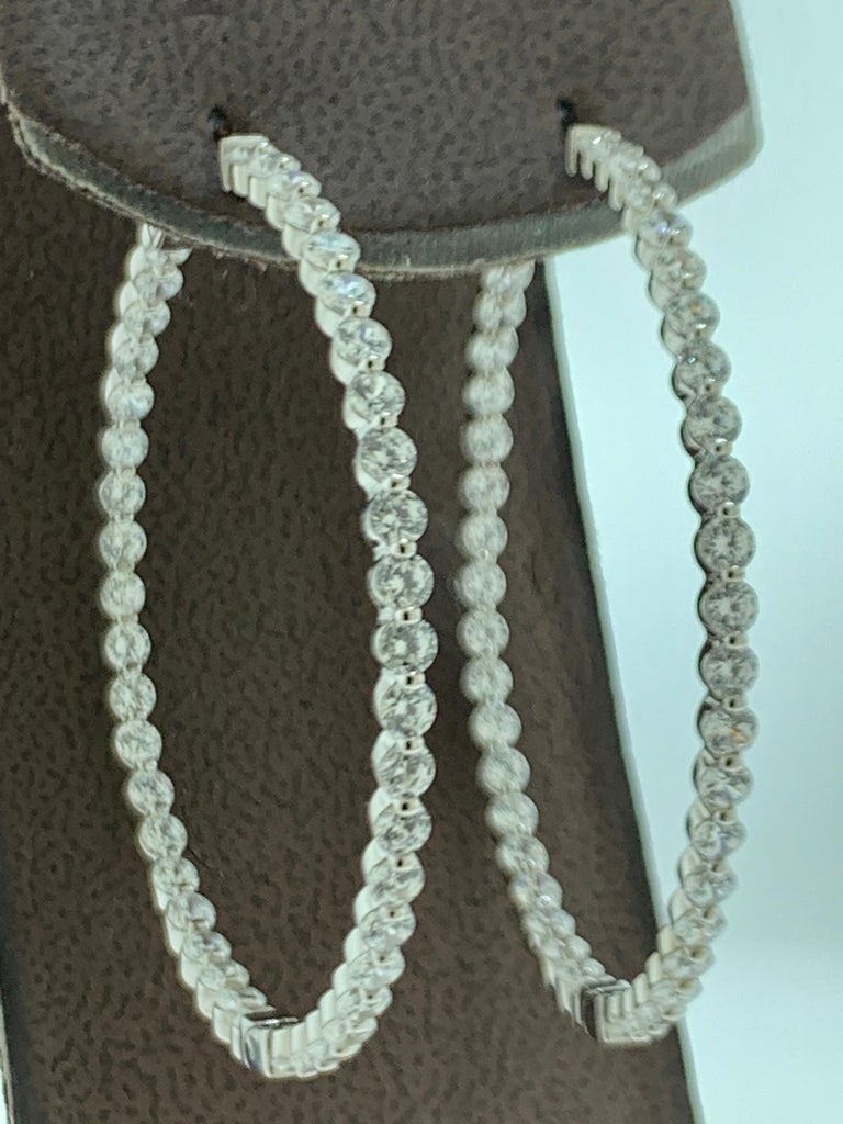 Hot Fashionable Large Inside Out Hoops in Sterling Silver And Cubic ...