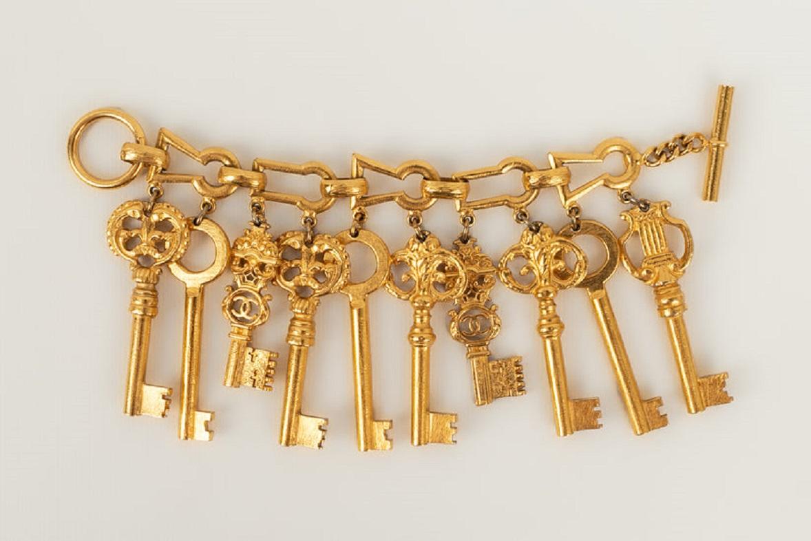 Iconic Chanel Gold-Plated Metal "Keys" Bracelet, 1993 For Sale at 1stDibs