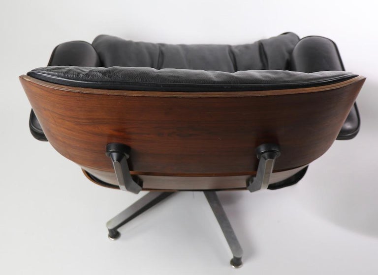 Iconic Eames Lounge Chair and Ottoman in Rosewood at 1stDibs