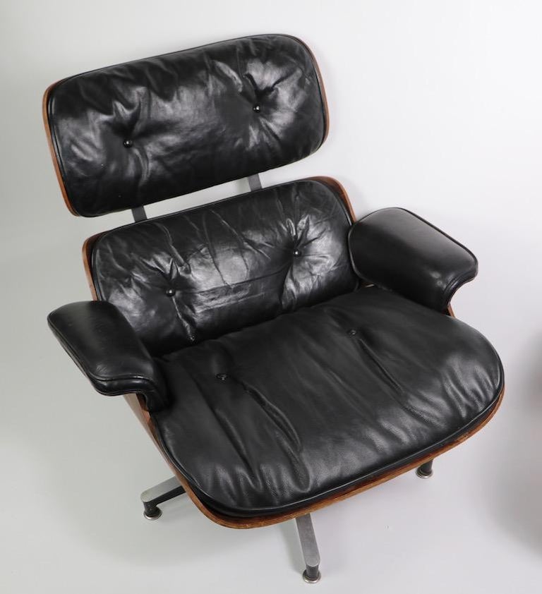 Iconic Eames Lounge Chair and Ottoman in Rosewood at 1stDibs