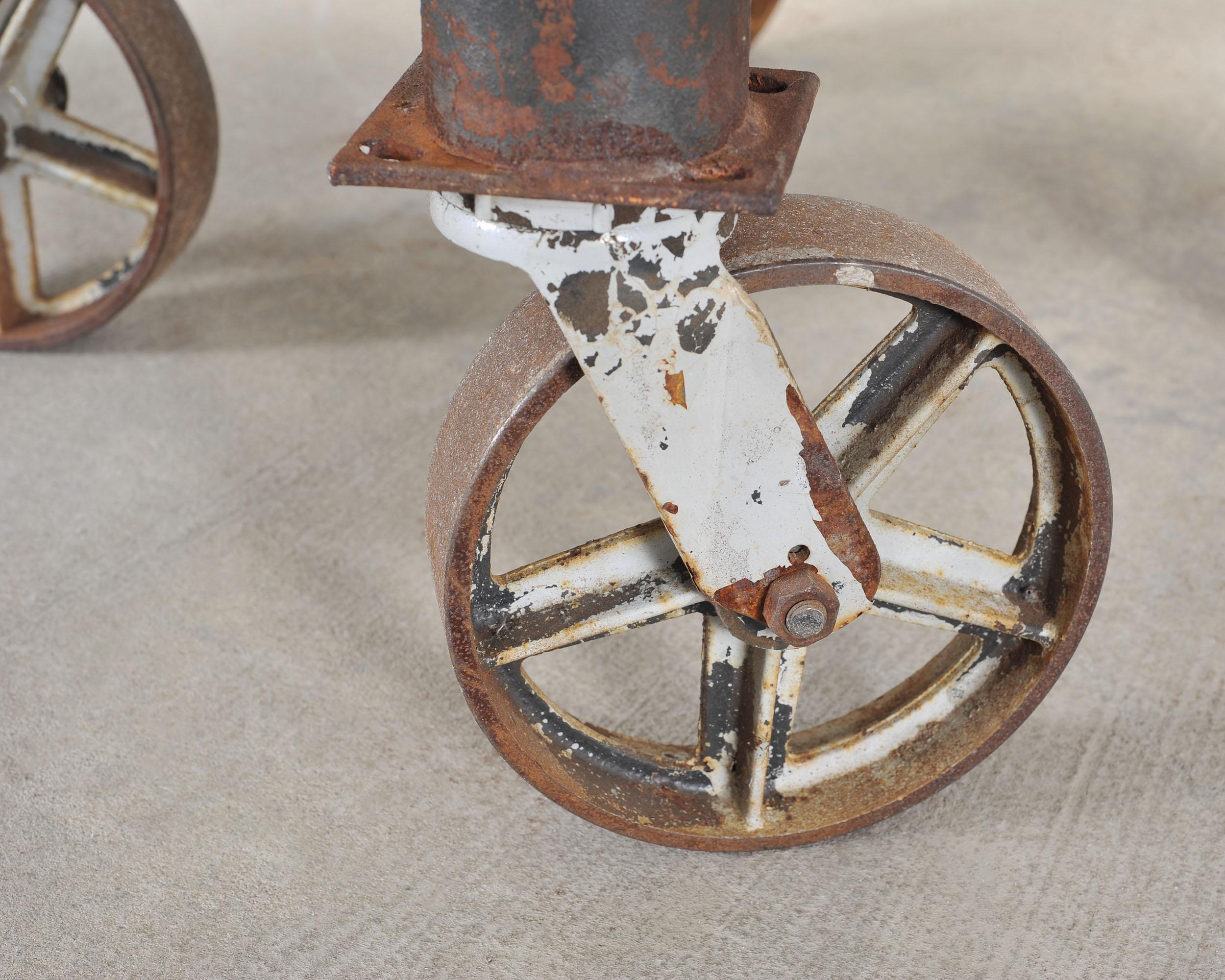 Industrial Style Round Machined Iron Center Table on Casters For Sale ...