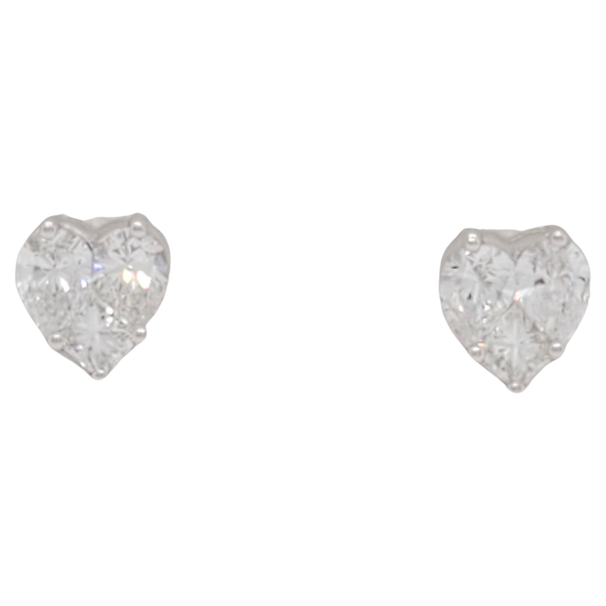 Boucles d'oreilles en or blanc serties de diamants en serti invisible ...
