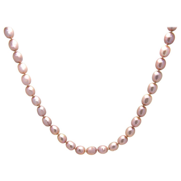 Iridesse Oval Pink Cultured Pearls with Folder and Box at 1stDibs