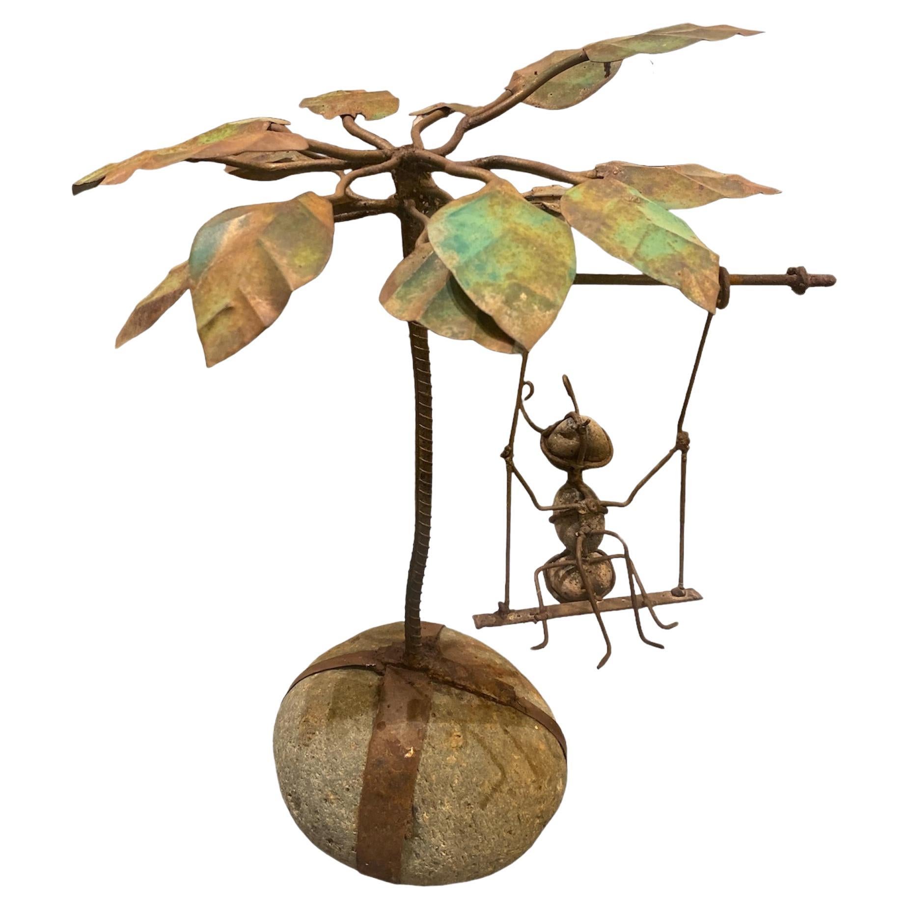 Iron and Rock Ant on Tree Swing Sculpture For Sale at 1stDibs