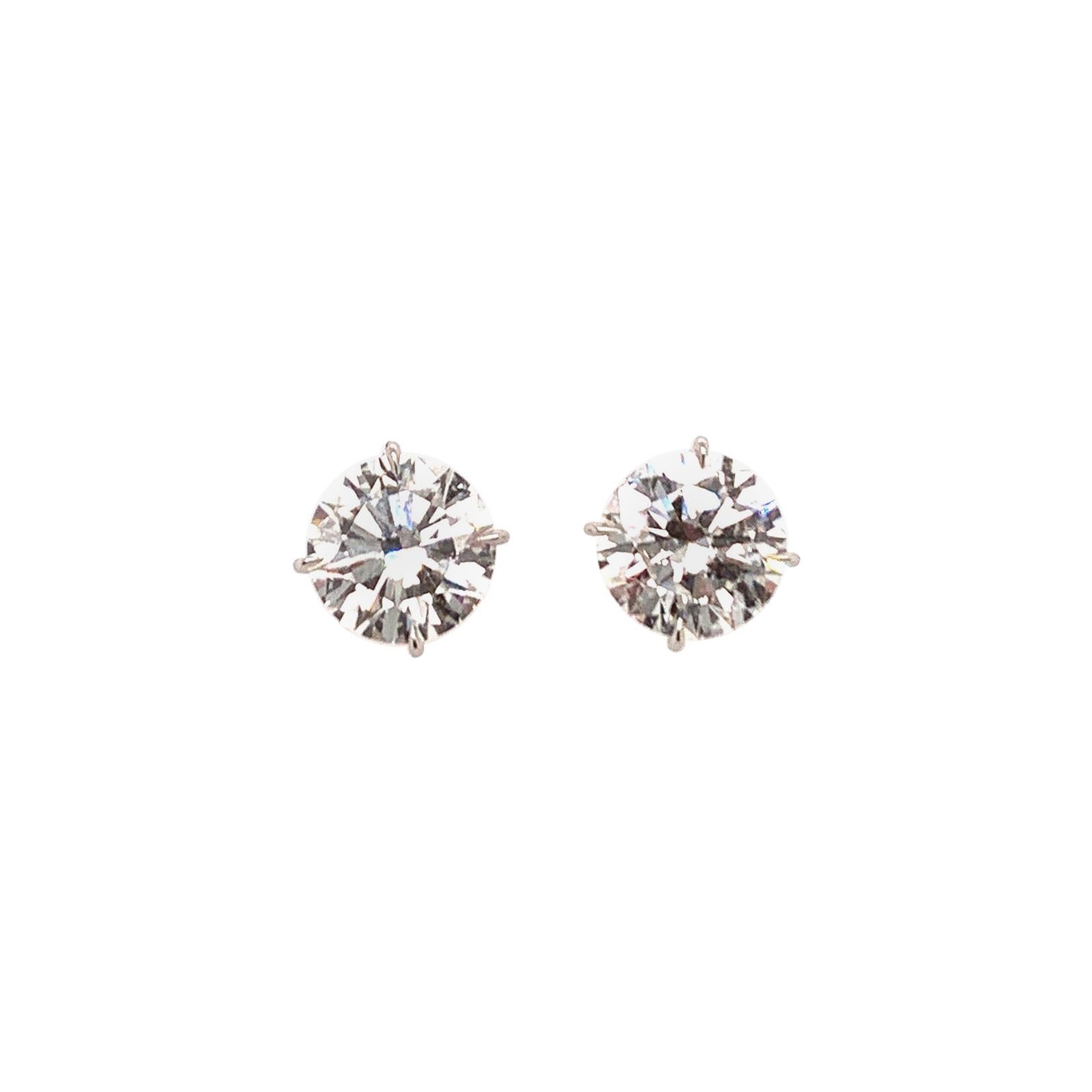 Cartier Diamond Round Cut Stud Earrings GIA 0.49 Carat Platinum at 1stdibs