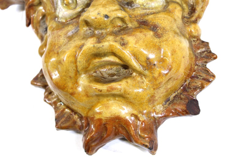 Italian Baroque Revival Glazed Terracotta Puck Mask For Sale at 1stDibs