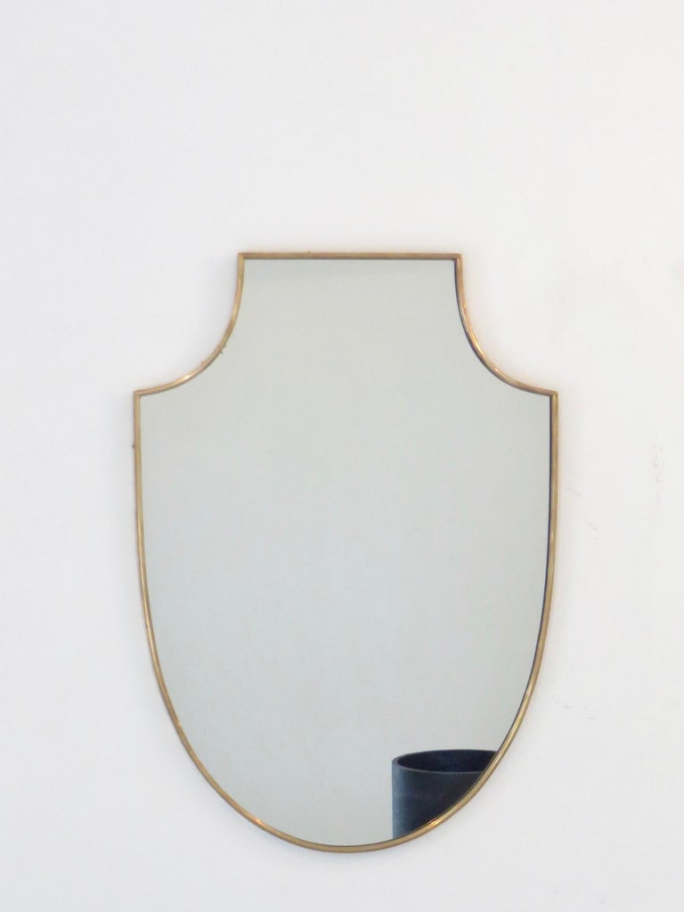 Italian Brass Framed Shield Shaped Vintage Wall Mirror at 1stDibs