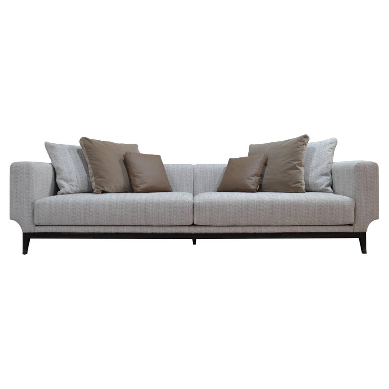 Italian Ivory Sofa with Brown Wooden Base For Sale at 1stDibs