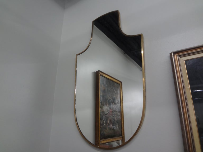 Italian Modern Brass Shield Shaped Mirror For Sale at 1stDibs