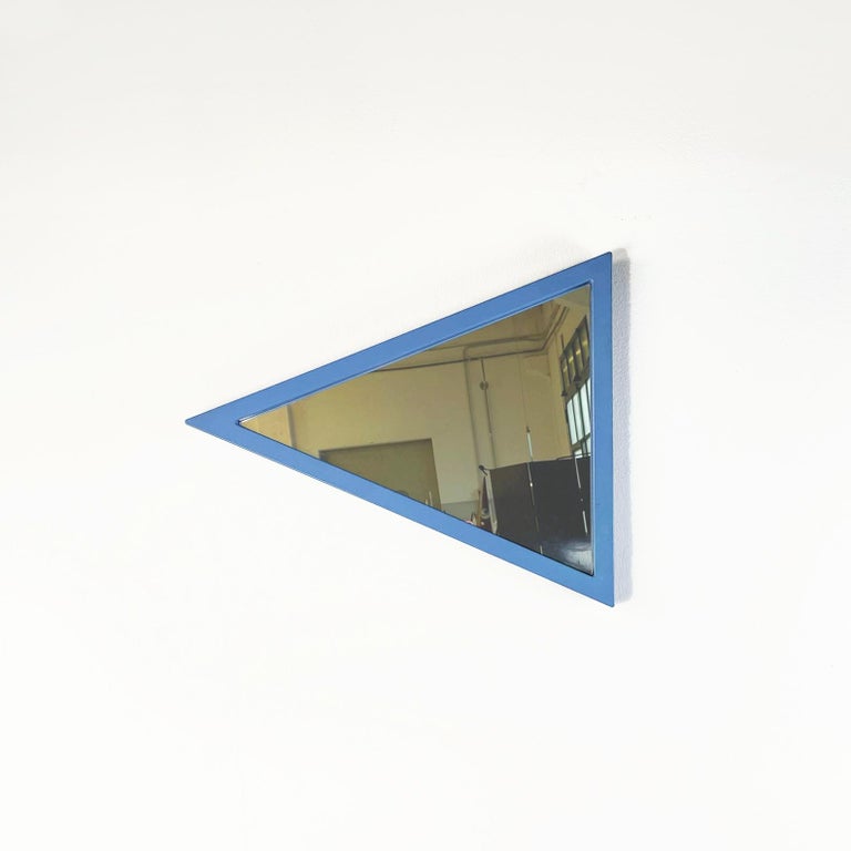Italian modern Triangular wall mirror with light blue wooden frame ...