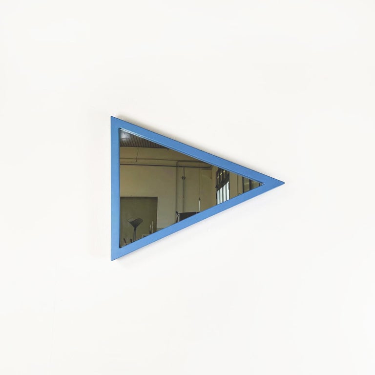 Italian modern Triangular wall mirror with light blue wooden frame ...