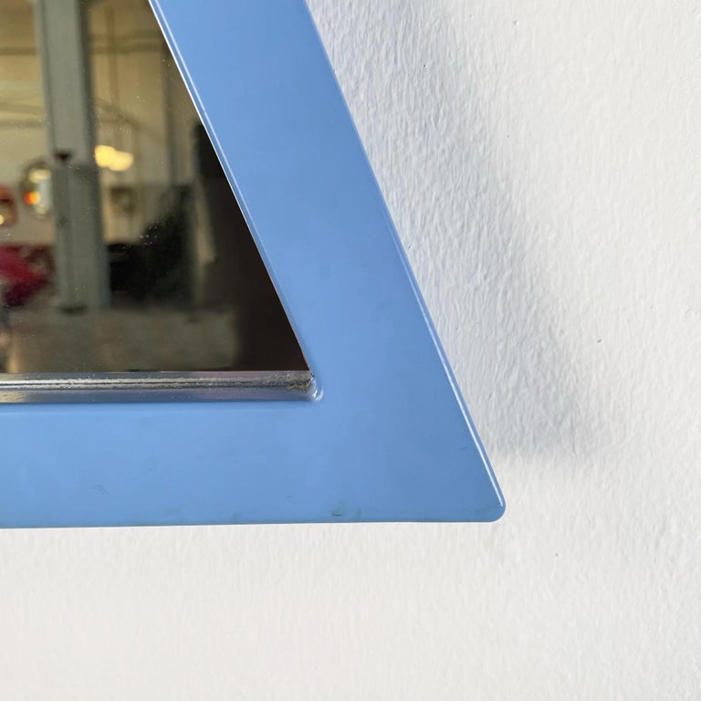 Italian modern Triangular wall mirror with light blue wooden frame ...