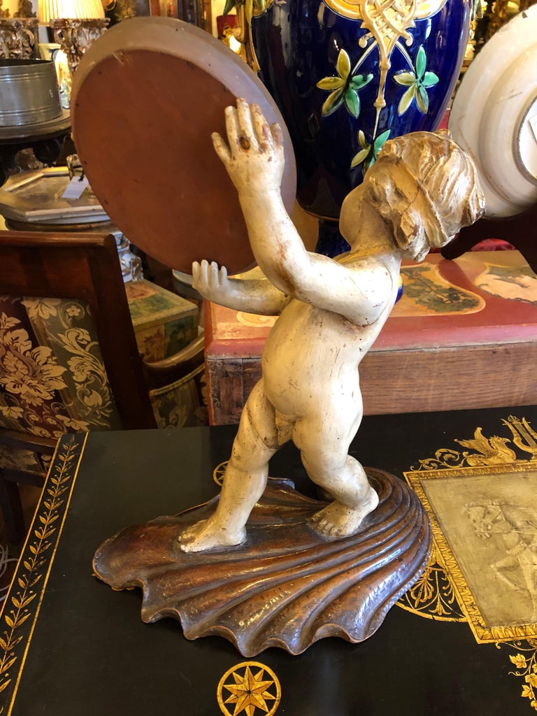 Italian Putti Holding a Mirror For Sale at 1stDibs