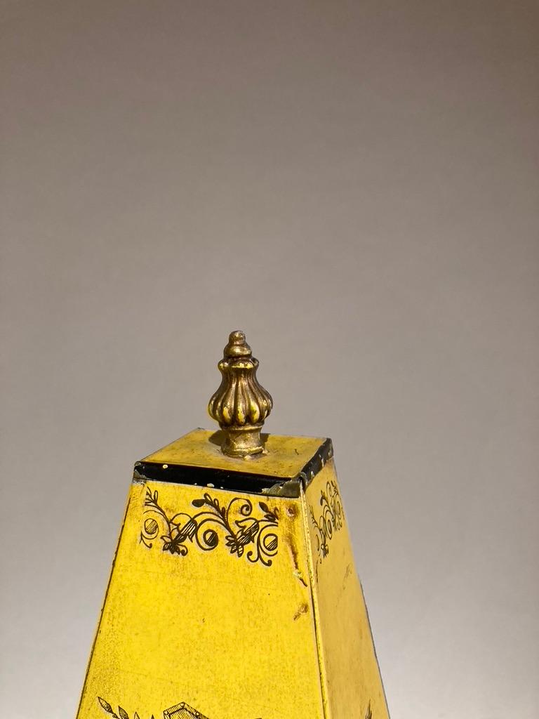 Italian Yellow Tole Obelisk Urn With Paw Feet For Sale at 1stDibs