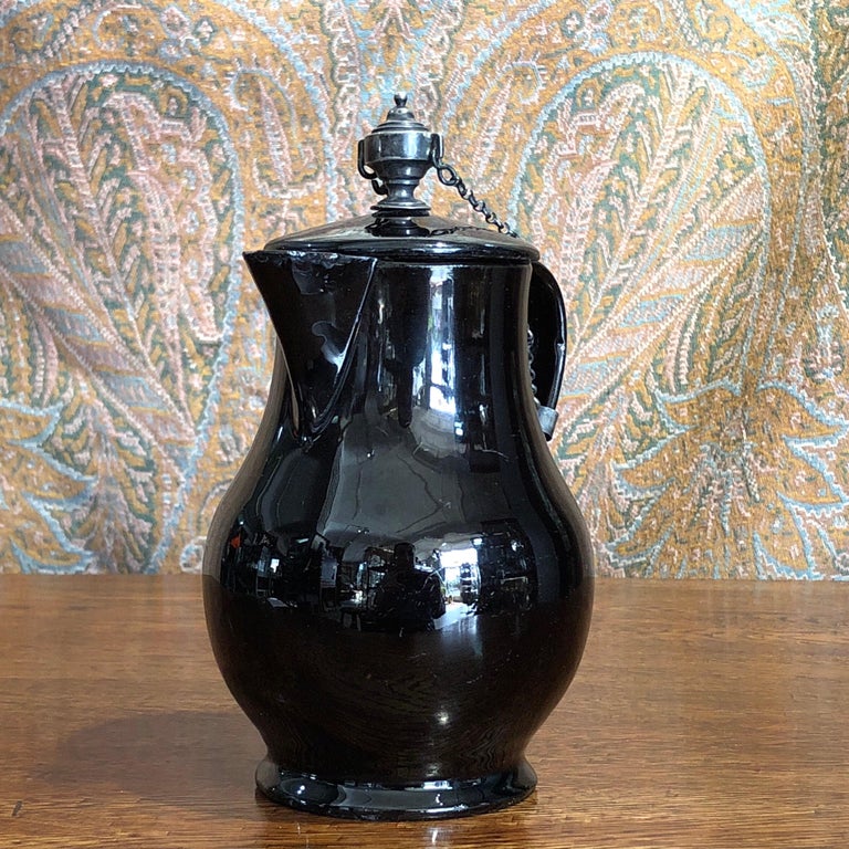 Jackfield Glaze Jug and Cover, Silver Urn Knop and Animal Head Terminal ...