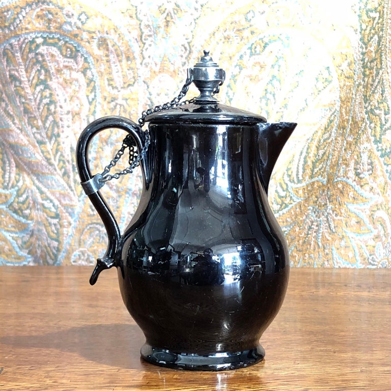 Jackfield Glaze Jug and Cover, Silver Urn Knop and Animal Head Terminal ...